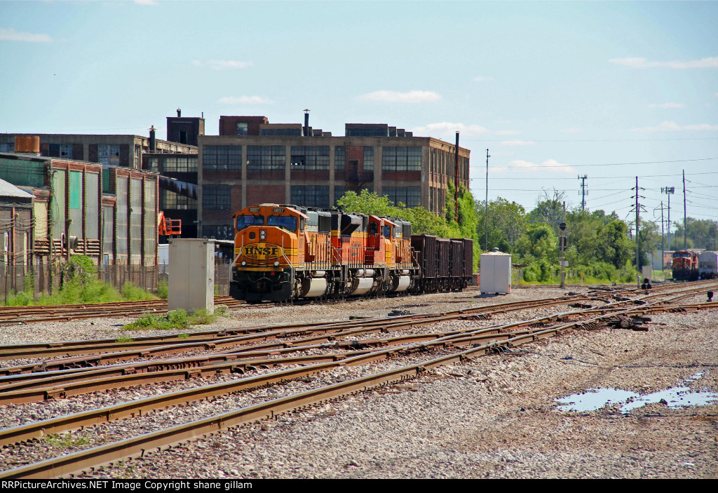 BNSF 8897 and its sister's are tied down on a ore train.